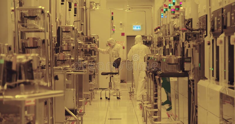 Workers in Clean Room in a Semiconductors Manufacturing Facility Stock ...