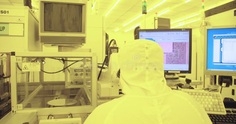 Workers in Clean Room in a Semiconductors Manufacturing Facility Stock ...
