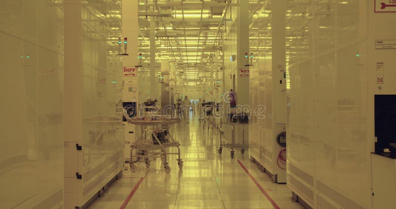 Workers in Clean Room in a Semiconductors Manufacturing Facility Stock ...