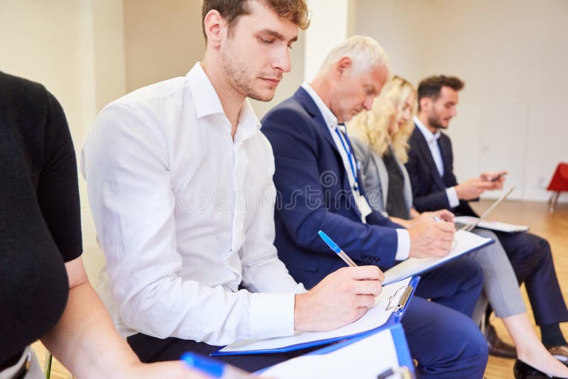Seminar Participants with Clipboard Take Notes Stock Photo - Image of ...