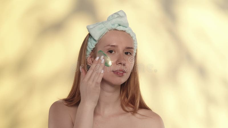 A Seminude Woman With Regular Features Touches The Clean Moisturized