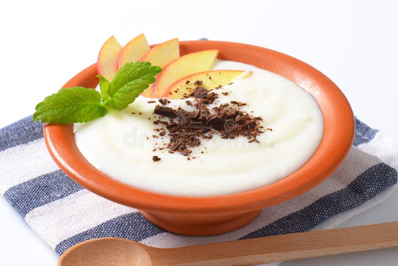 Semolina or Rice Pudding with Apple and Chocolate Stock Photo - Image ...