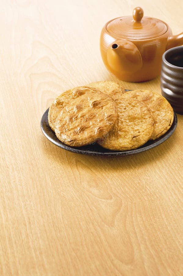 Senbei and green tea stock image. Image of cracker, asian - 27614081