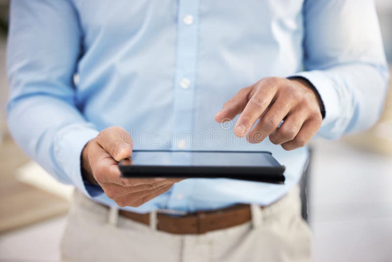 Sending Off Important Documents. a Businessman Using His Digital Tablet ...