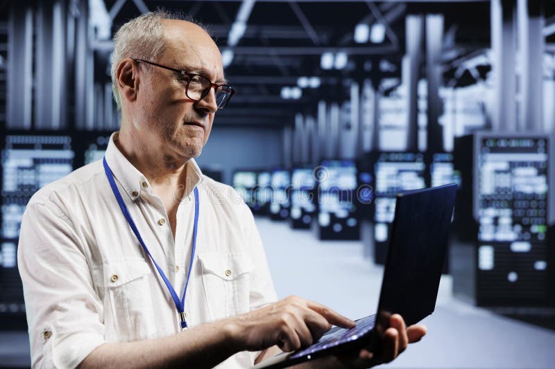 Senescent System Admin Inspects Servers Stock Image - Image of business ...