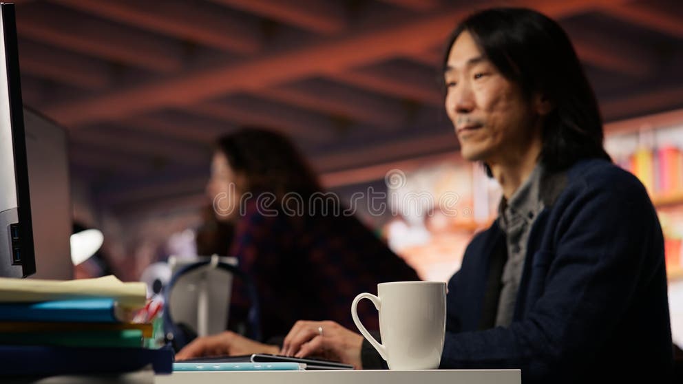 Senior Admin Working in Innovative Startup Office, Close Up Stock Photo ...