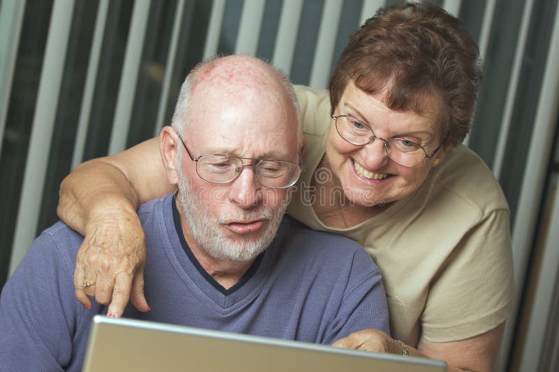 Senior Adults on Laptop Computer Stock Image - Image of couple, sitting ...