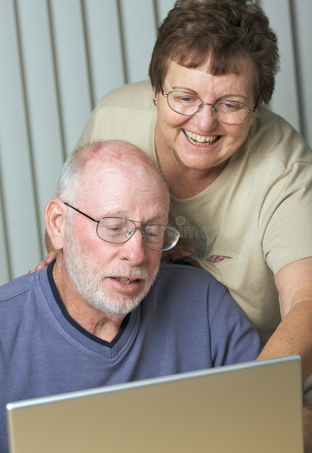 Senior Adults on Laptop Computer Stock Photo - Image of smiling ...