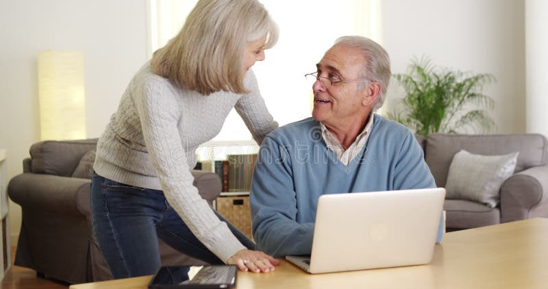 Senior Adults Using Laptop Computer at Desk Stock Video - Video of ...