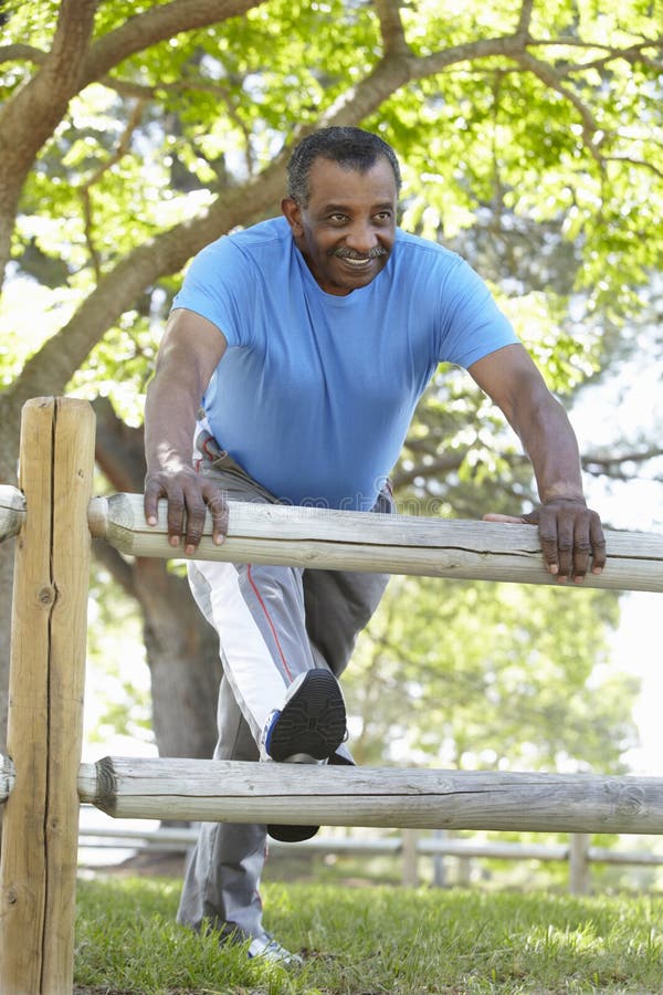 Senior African American Man Exercising in Park Stock Image - Image of ... Senior African American Man Exercising in Park Stock Image - Image of ...