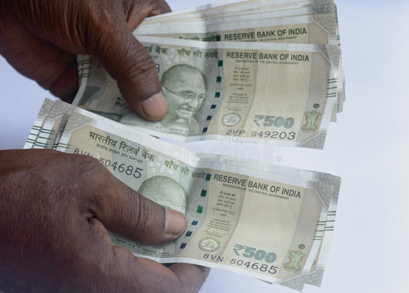 Senior Aged Man Hand Counting Indian Rupee Note on Table. High Angle ...