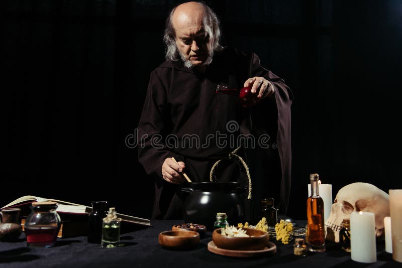 Senior Alchemist Adding Ingredient into Pot Stock Image - Image of ...