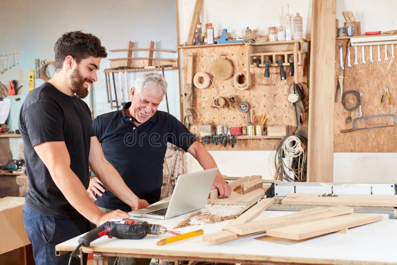 Senior and Apprentice at Laptop Computer Stock Image - Image of website ...
