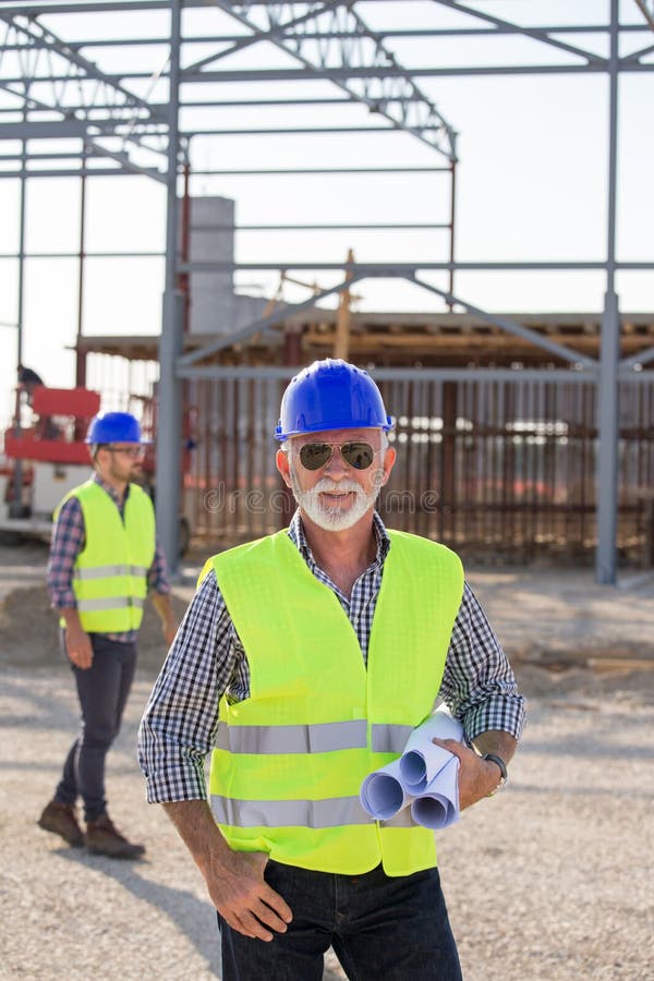 Senior Architect at Building Site Stock Image - Image of folded, happy ...