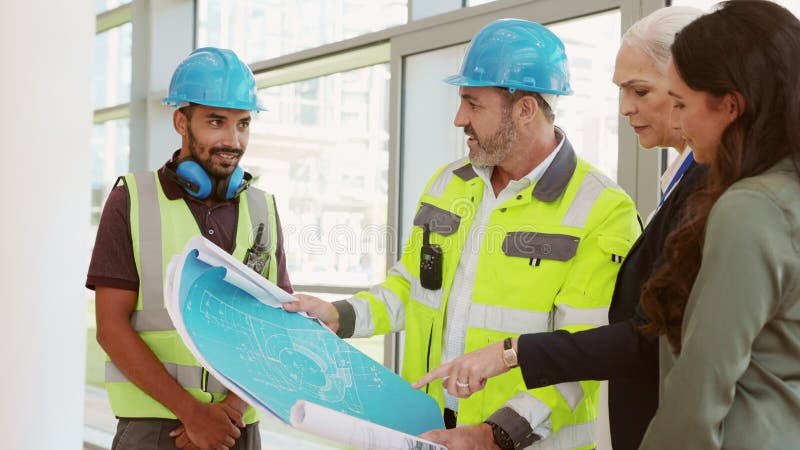 Mature Engineer and Contractor Woman Discussing at Construction Site ...