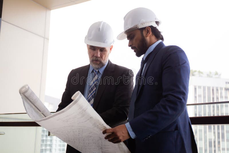 Senior Architect Inspector Check Blueprint and Structure with ...