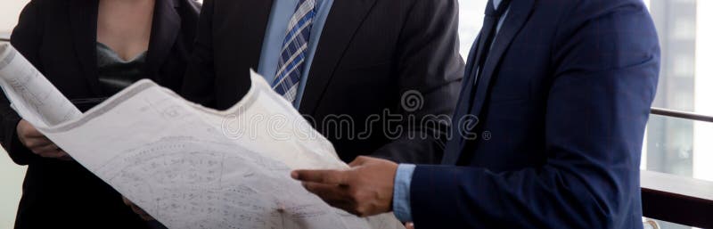 Senior Architect and Secretary Inspector Check Blueprint and Structure ...