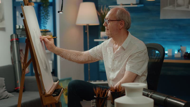 Senior Artist Drawing Professional Artwork with Vase Model Stock Video ...