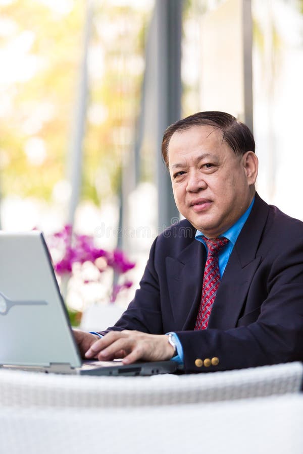 Senior Asian Businessman in Suit Using Laptop PC Stock Photo - Image of ...