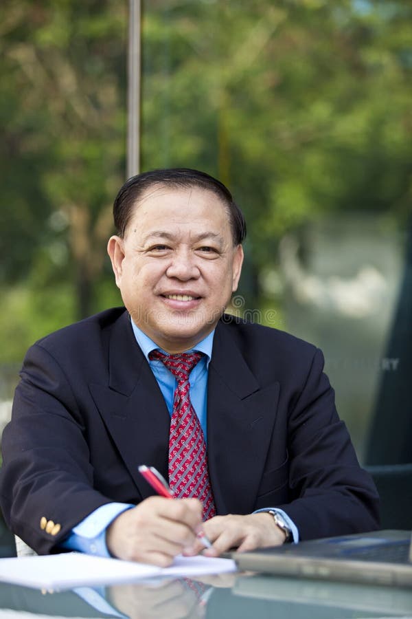 Senior Asian Businessman Writing Proposal Stock Image - Image of ...