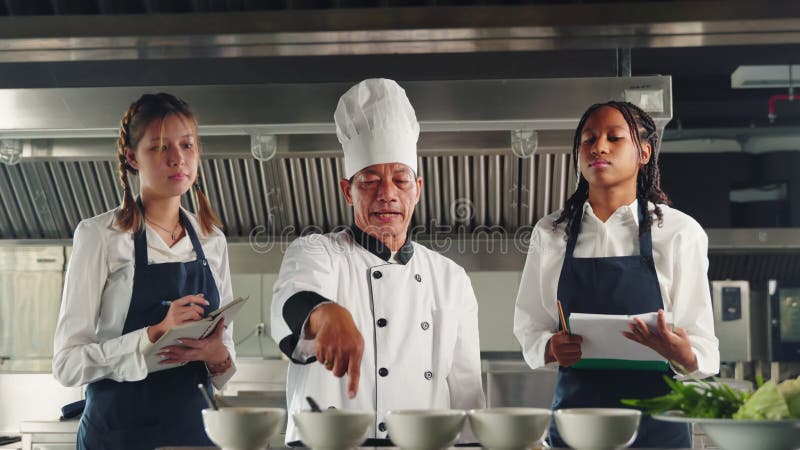 Asian Senior Chef in Uniform Educates Multiracial Students in a ...