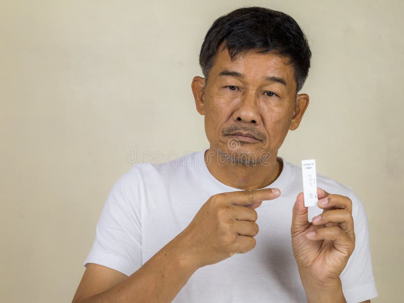 Senior Asian Man Self-test for Covid-19 Stock Photo - Image of ...