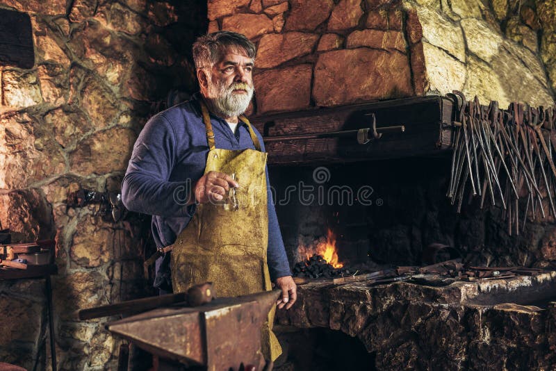 Senior Blacksmith Forge Iron Stock Image - Image of smith, craftsman ...