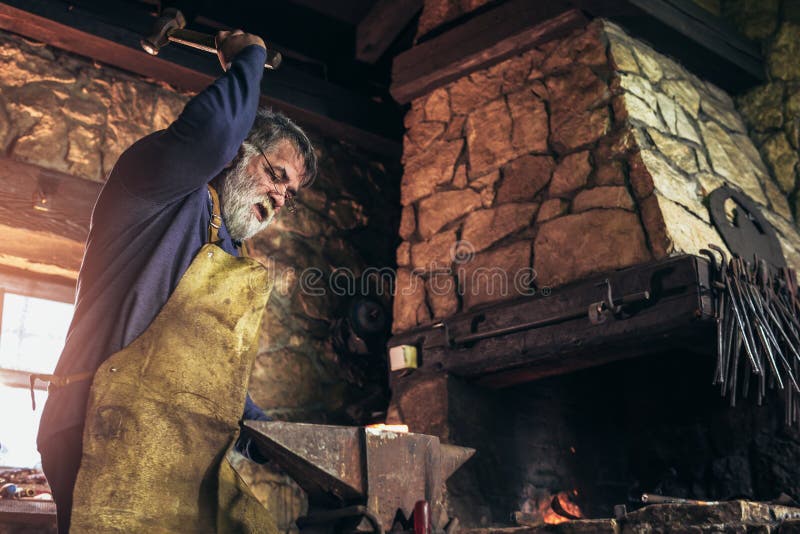 Senior Blacksmith Forge Iron Stock Image - Image of craftsman ...