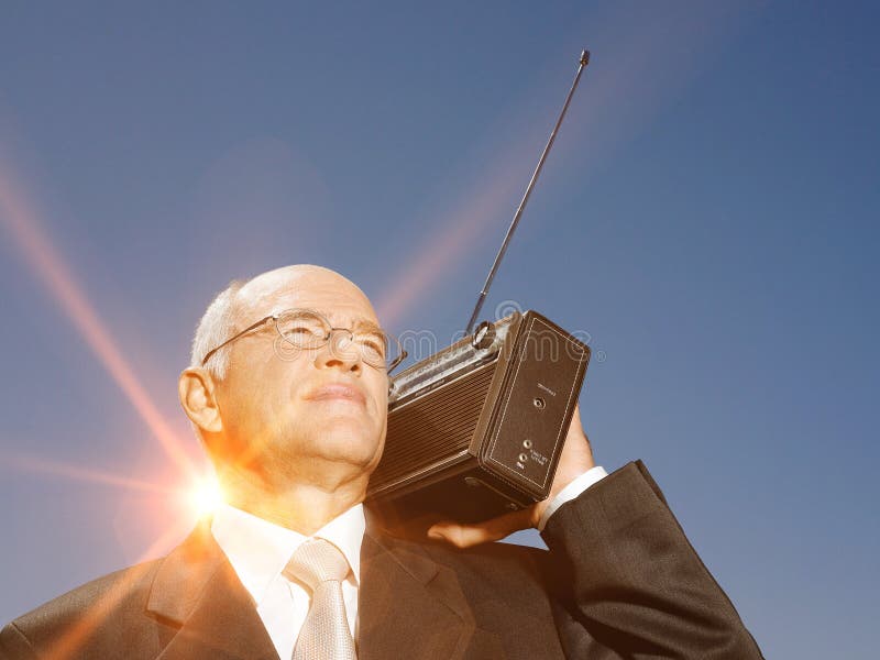 Businessman Listening Music on Radio in Desert Stock Image - Image of ...