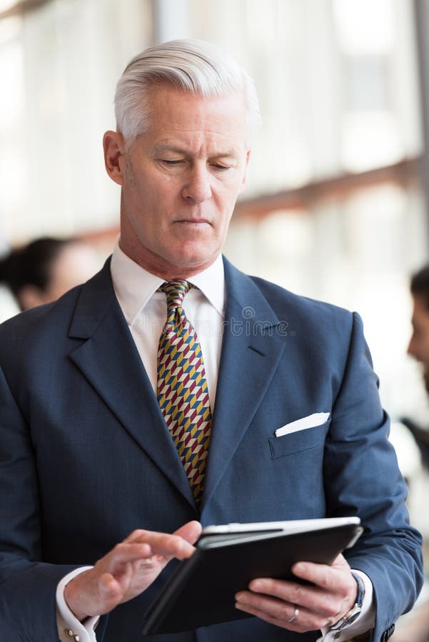Senior Business Man Working on Tablet Computer Stock Photo - Image of ...