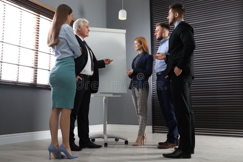 Senior Business Trainer Working with People Stock Photo - Image of ...