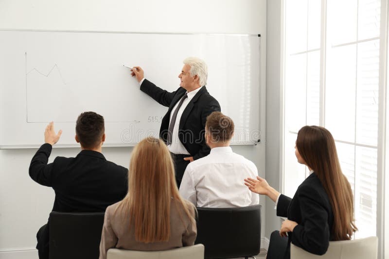 Senior Business Trainer Working with People Stock Photo - Image of ...