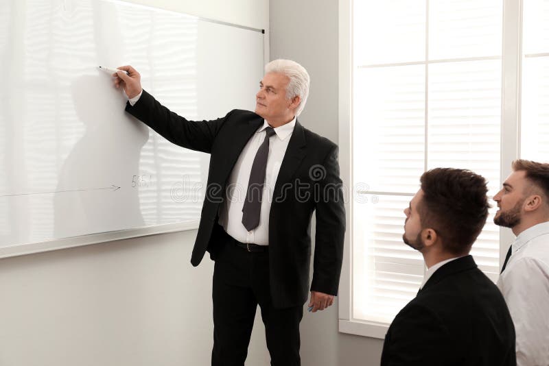 Business Trainer Working with People in Office Stock Photo - Image of ...