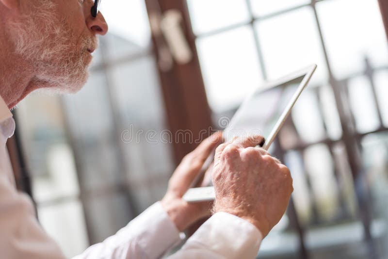 Senior Businessman with Tablet, Hard Light Effect Stock Image - Image ...