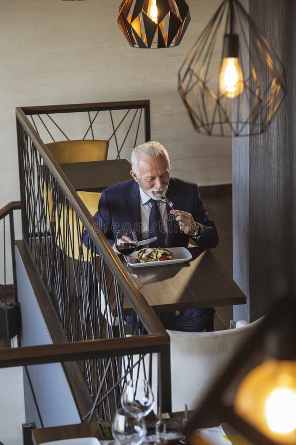 Senior Businessman Taking a Lunch Break Stock Photo - Image of ...