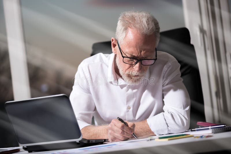 Senior Businessman Taking Notes, Light Effect, Hard Light Stock Image ...