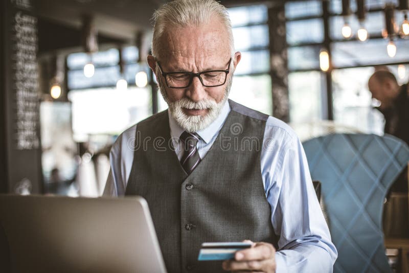 Senior Businessman Using E Banking. Stock Image - Image of ...