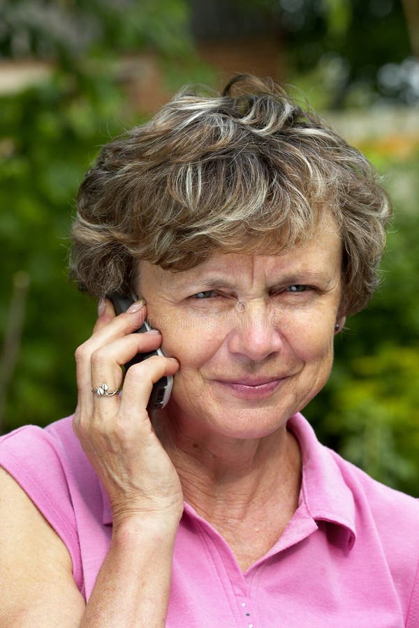 Elderly woman on cellphone stock photo. Image of enjoy - 5417326