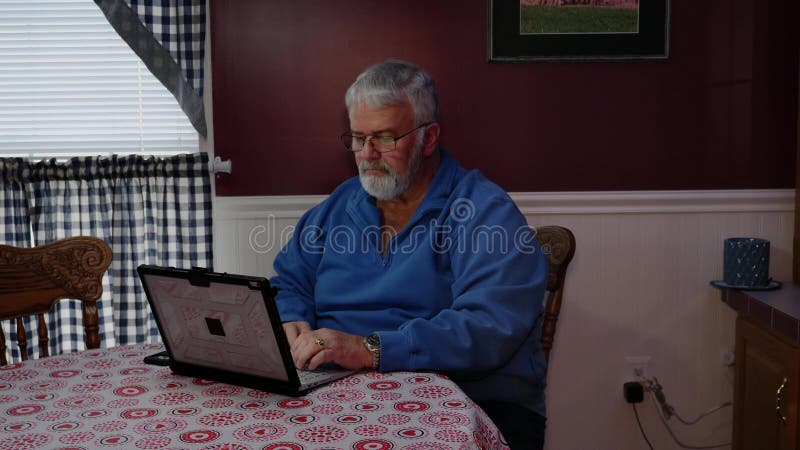 Senior Citizen Happy Using a Computer and Technology To Do daily ...