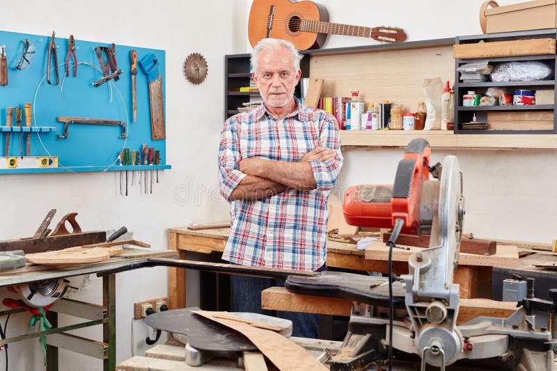 Senior Citizen Man As Craftsman Stock Image - Image of guitar, boss ...