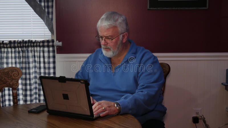 Senior Citizen Upset and Mad at Using a Computer and Technology Stock ...