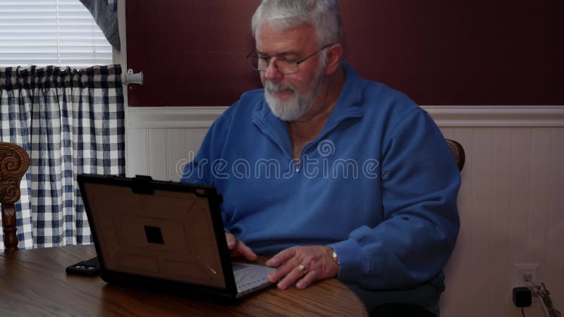 Senior Citizen Upset and Mad at Using a Computer and Technology Stock ... Senior Citizen Upset and Mad at Using a Computer and Technology Stock ...