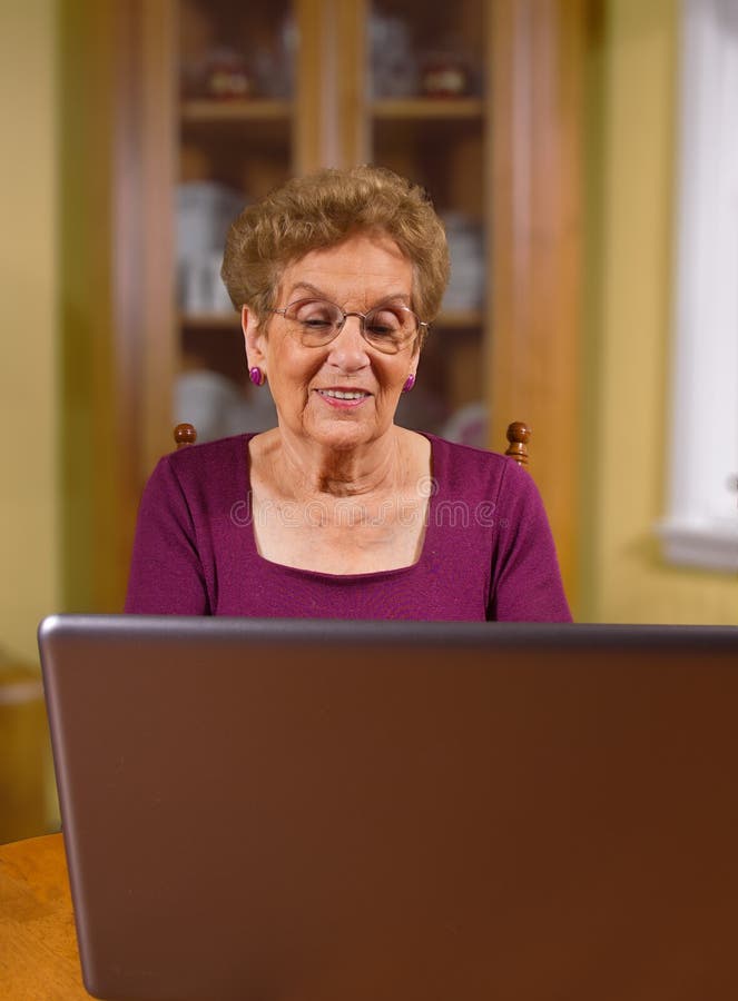 Senior Citizen Using Laptop Stock Photo - Image of happiness, people ...