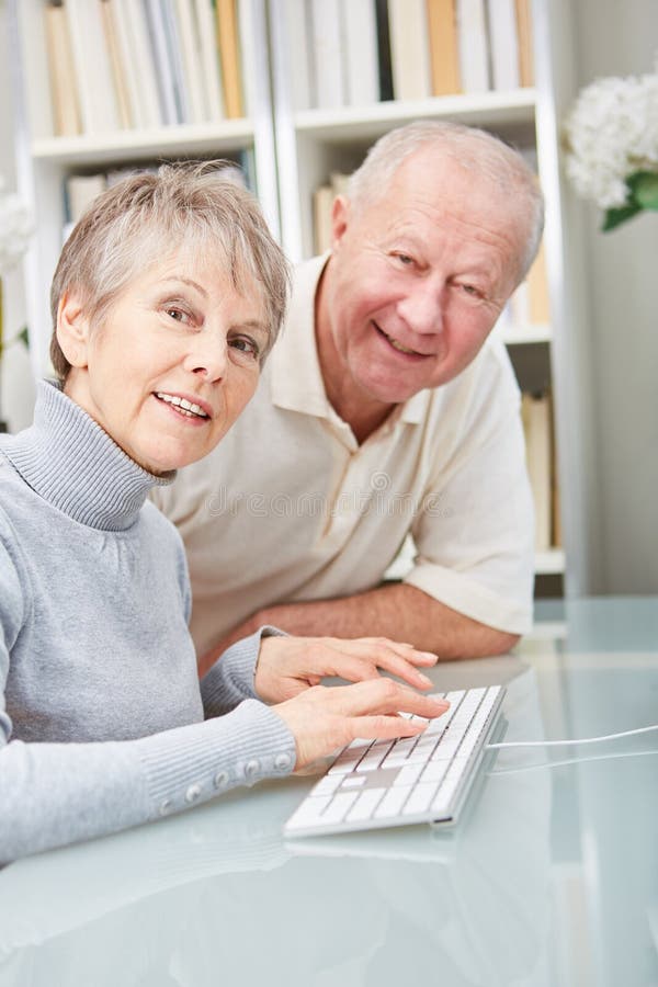 Senior Citizens As a Couple with Computer Stock Image - Image of women ...