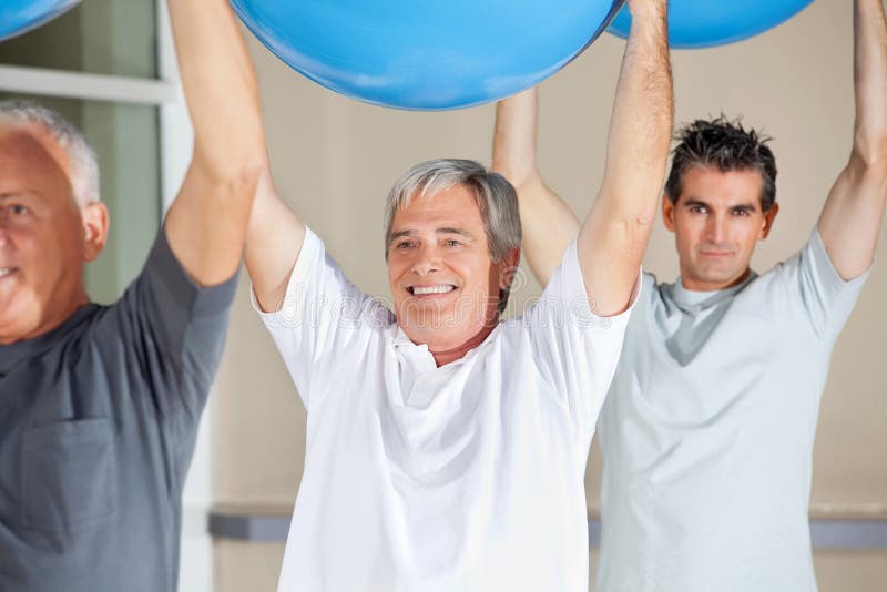 Senior citizens doing back stock photo. Image of exercise - 24058006