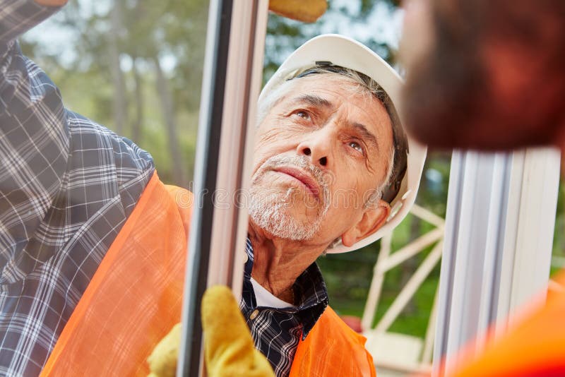 Senior Competent Window Fitter Stock Image - Image of glaziery ...