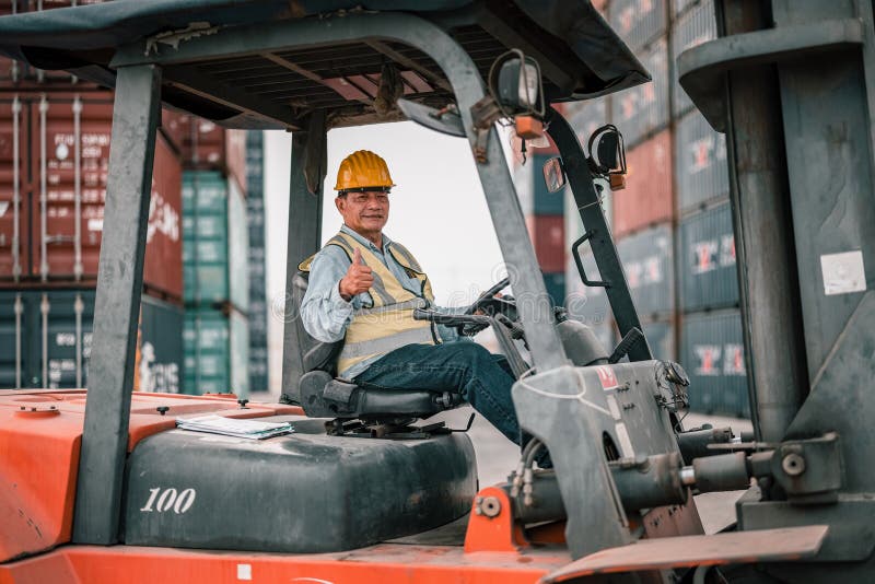 Senior Container Controllers Navigate and Drive Folklift To Transfer ...