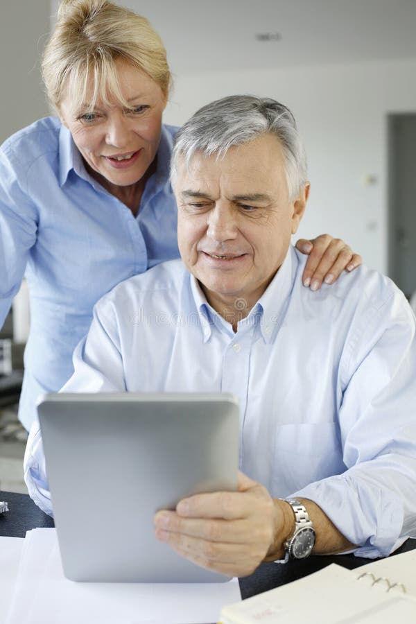 Senior Couple Checking Their Bank Account Stock Photo - Image of ...
