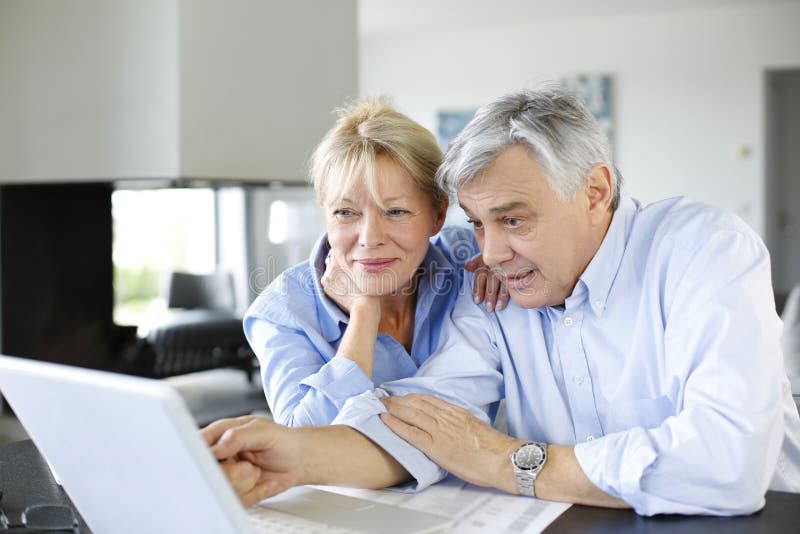 Senior Couple Connected on Internet Stock Photo - Image of computer ...