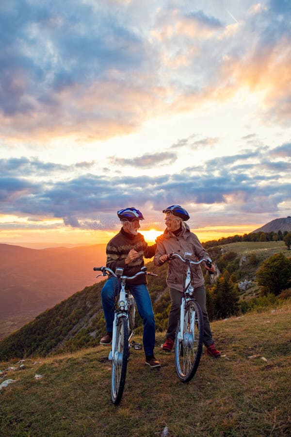Senior Couple on Cycle Ride in Countryside Stock Photo - Image of ...